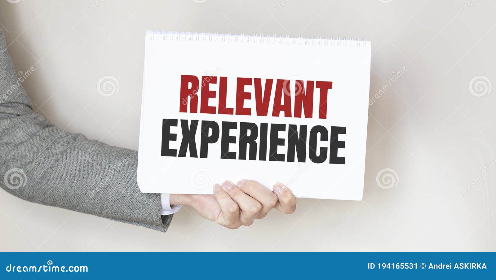 Businessman Holding a Card with Text RELEVANT EXPERIENCE Stock Image ...