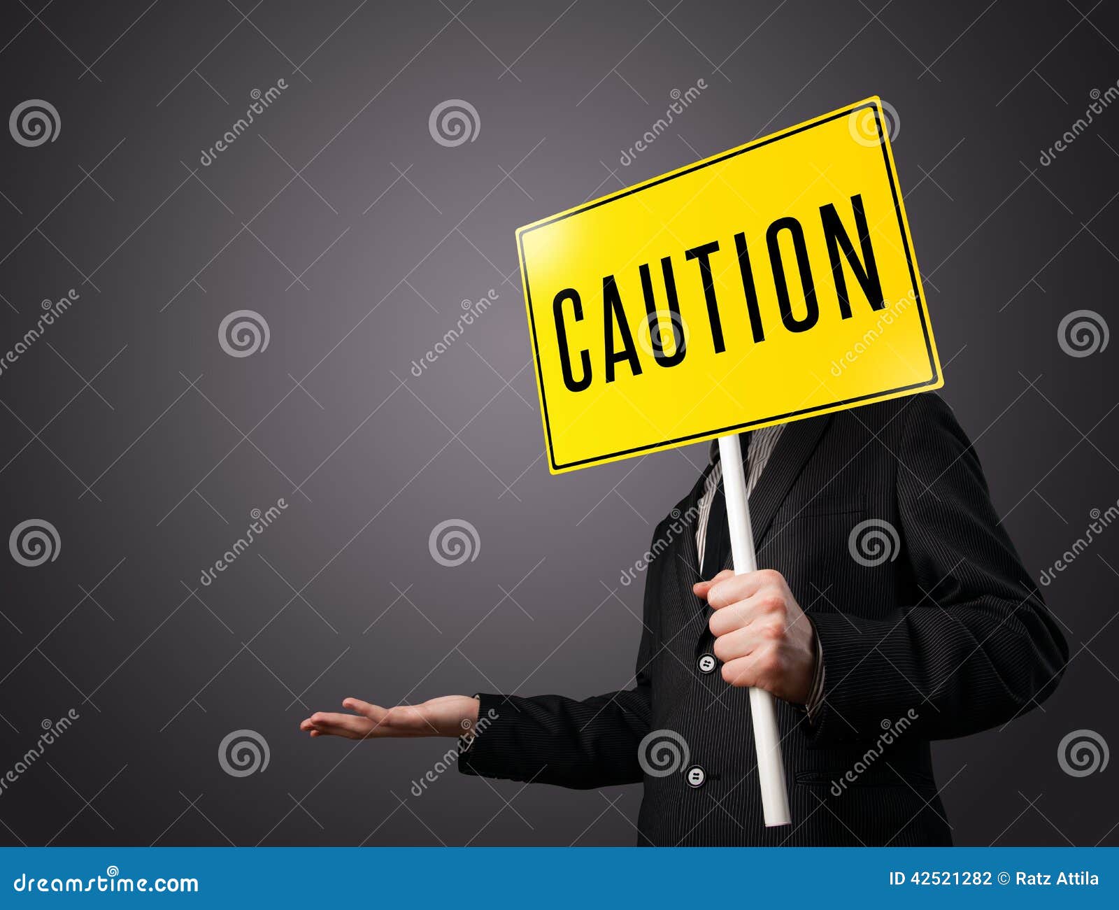Businessman Holding a Caution Sign Stock Photo - Image of handsome ...