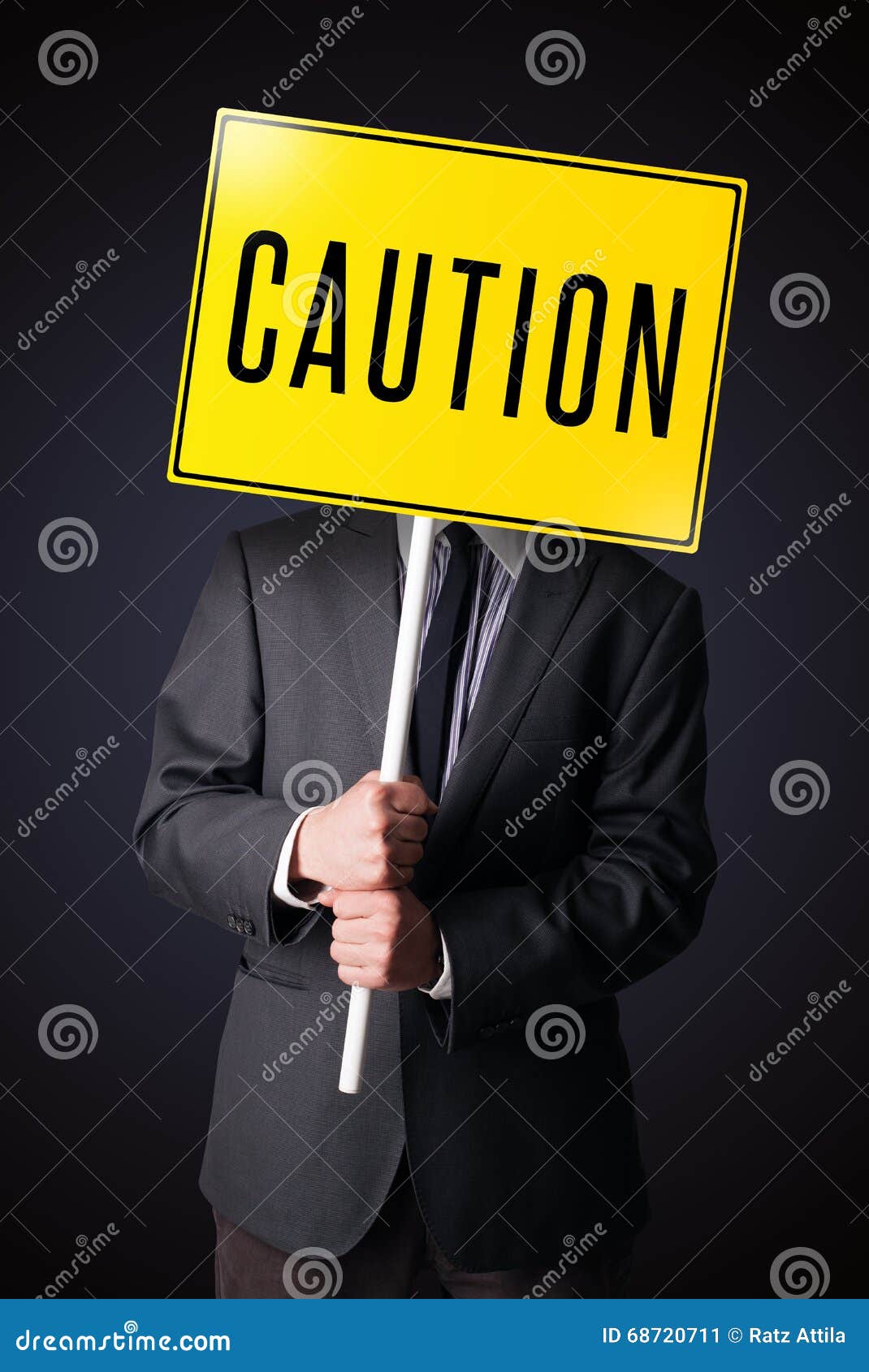 Businessman Holding a Caution Sign Stock Image - Image of male, beware ...