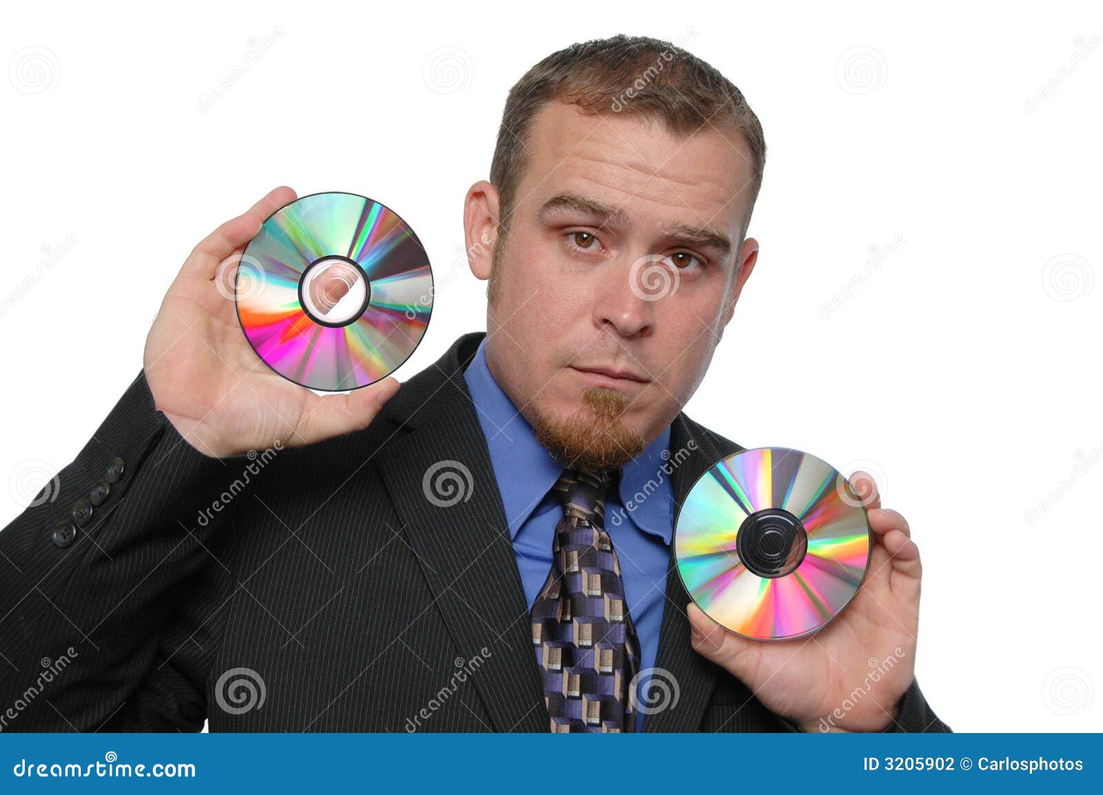 Businessman holding CDs stock photo. Image of business - 3205902