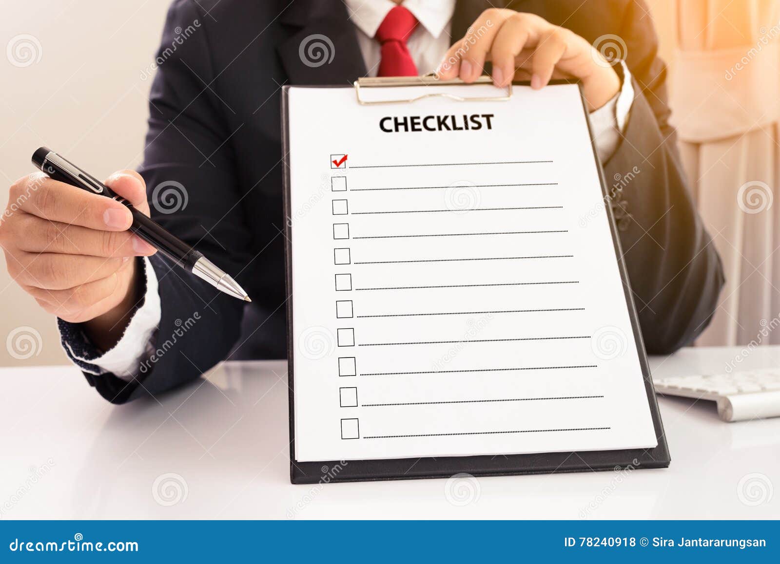 Businessman Holding Clipboard with Checklist Against Stock Photo ...