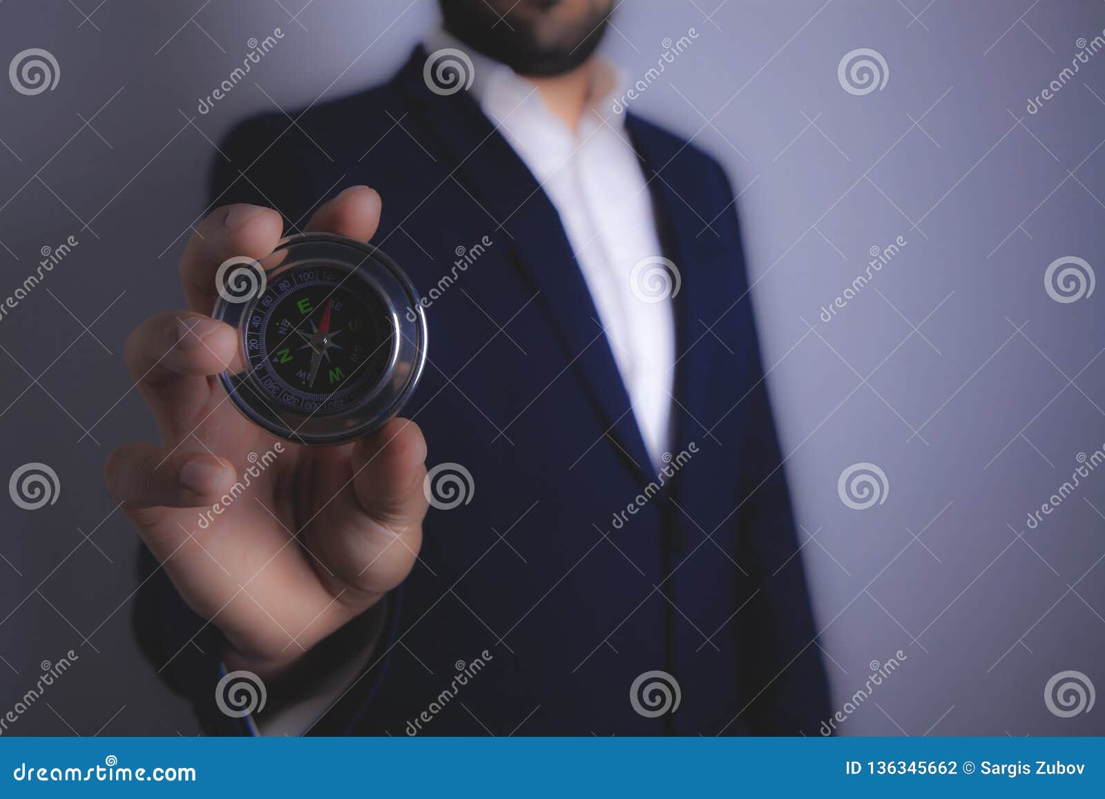 Businessman Holding a Compass Stock Photo - Image of travel, showing ...