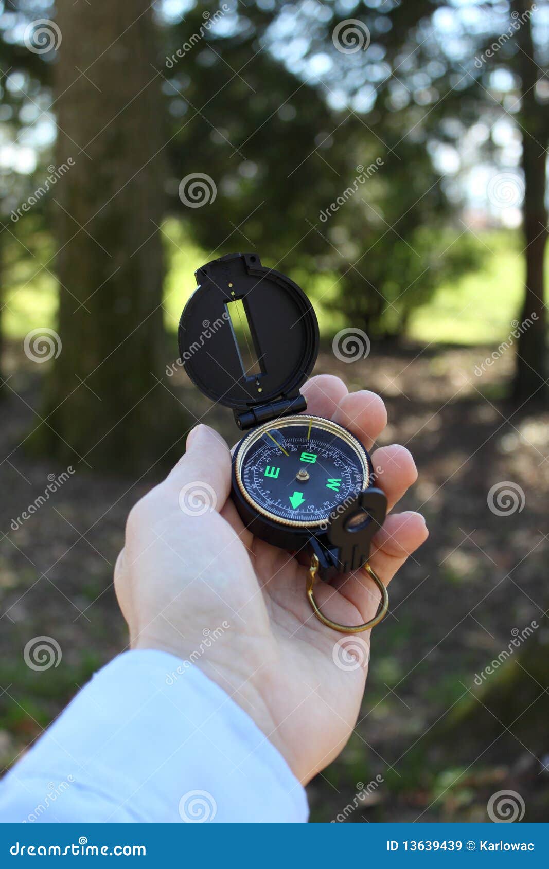 Businessman Holding a Compass Vertical Stock Image - Image of ...