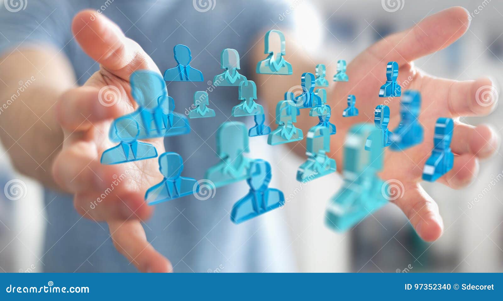 Businessman Holding 3D Rendering Group of Blue People Stock ...