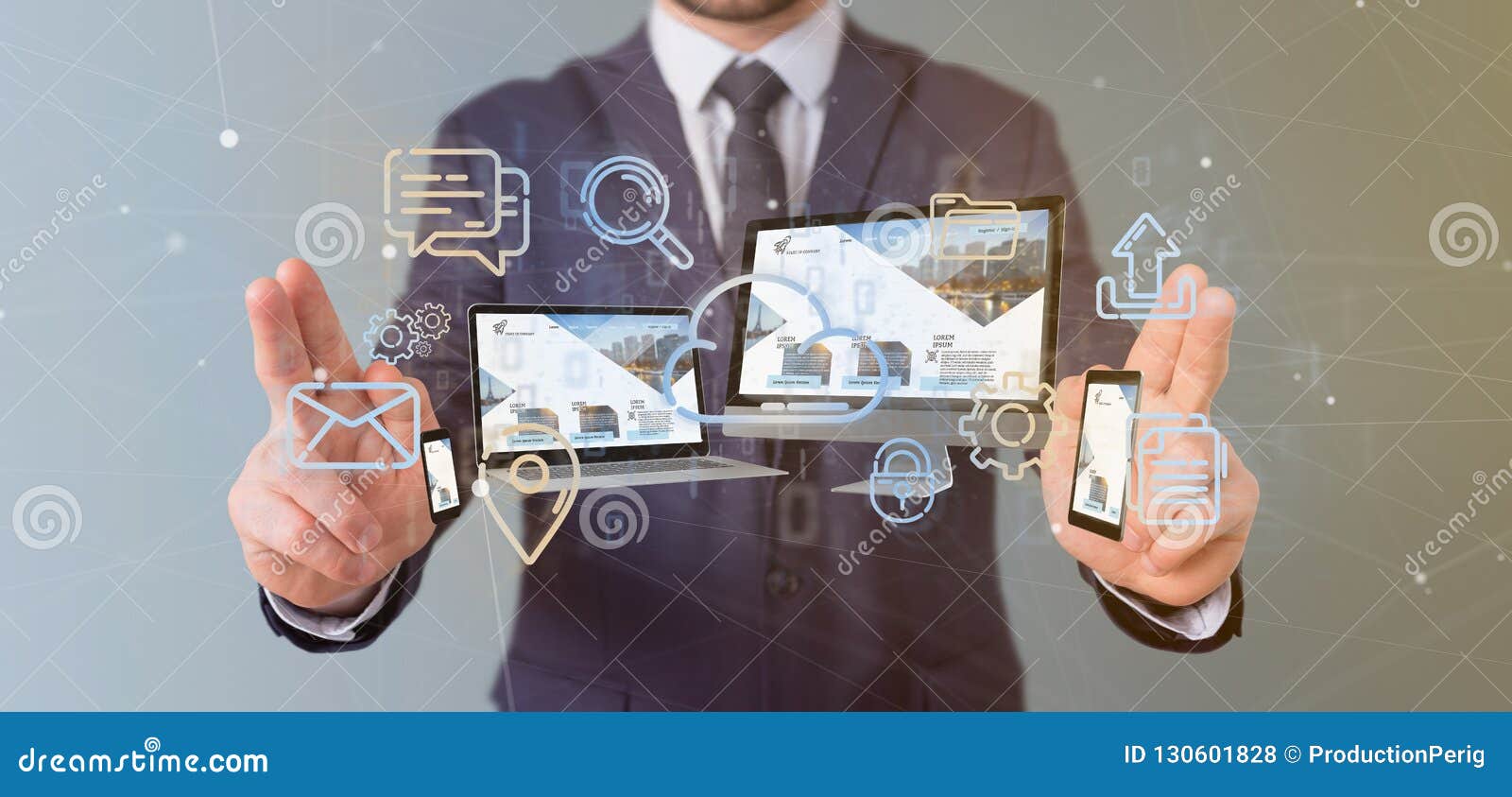 Businessman Holding a Devices Connected To a Cloud Multimedia Ne Stock ...