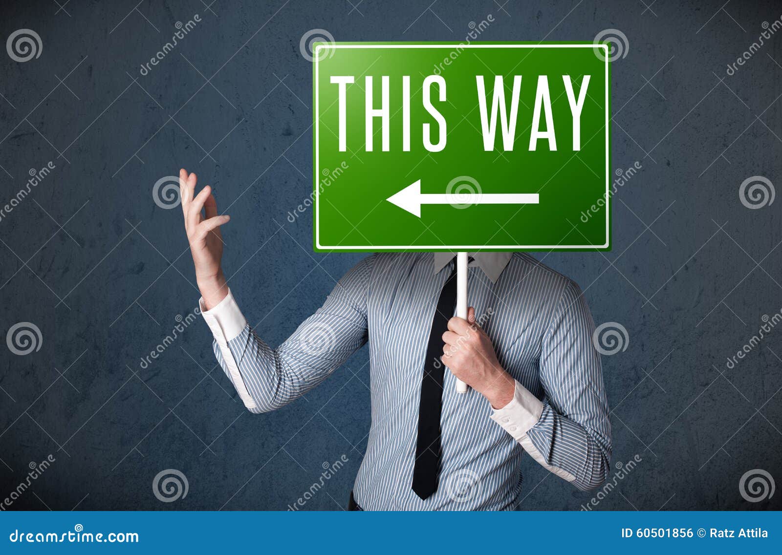 Businessman Holding a Direction Sign Stock Photo - Image of male ...