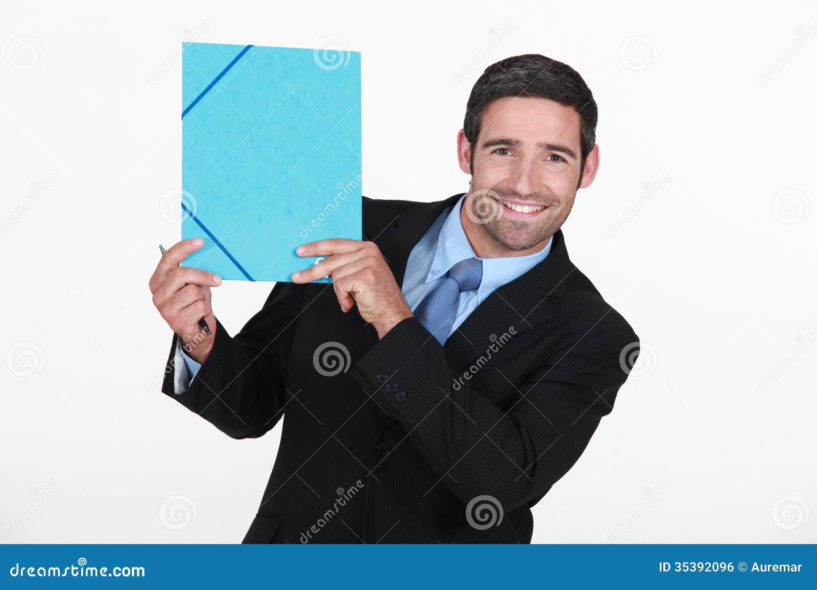 Businessman holding file stock photo. Image of isolated - 35392096