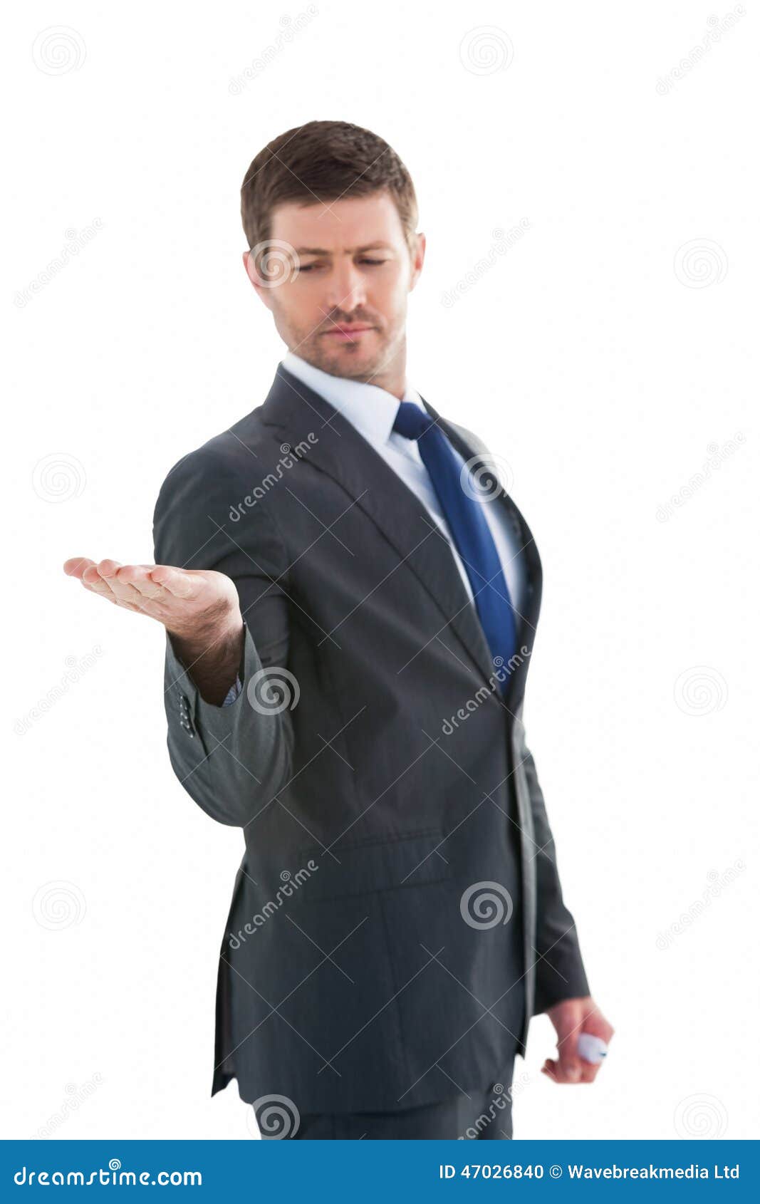 Businessman Holding Hand Out in Presentation Stock Photo - Image of ...