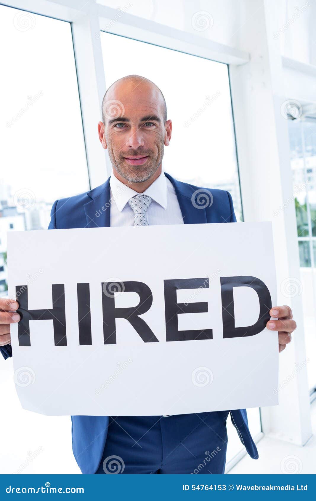 Businessman Holding a Hired Sign Stock Image - Image of elegant ...