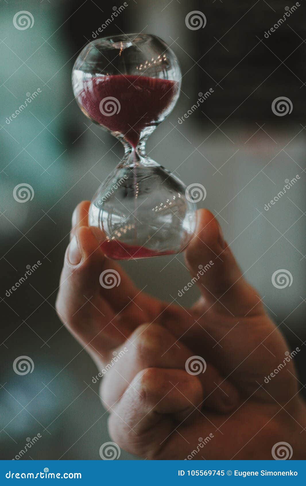 Businessman Holding Hourglass in the Office. Stock Image - Image of ...