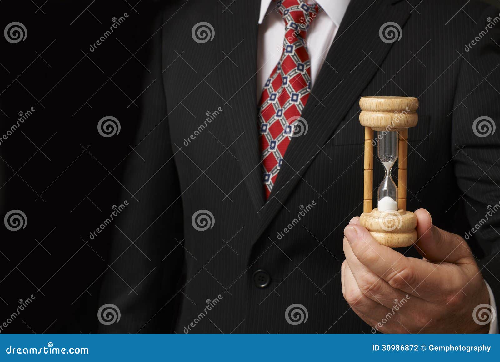 Businessman Holding Hourglass Stock Photo - Image of timer, hourglass ...