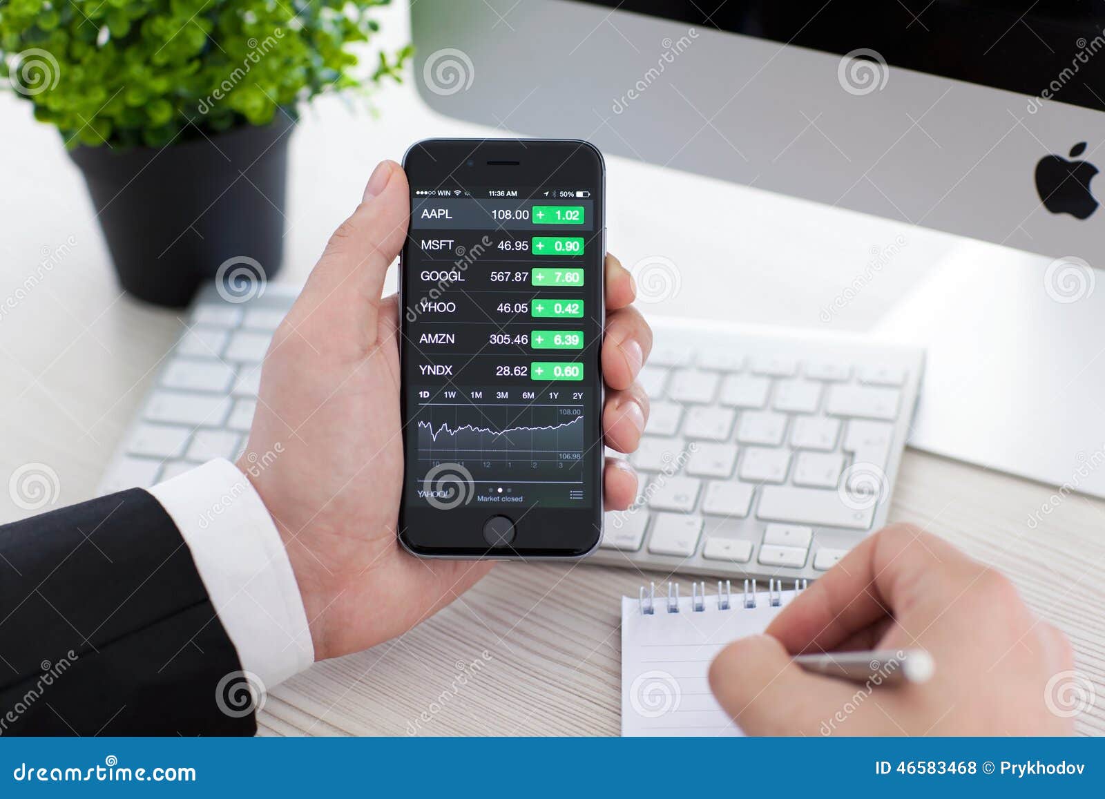 Businessman Holding IPhone 6 with Application Stocks of Apple Editorial ... Businessman Holding IPhone 6 with Application Stocks of Apple Editorial ...