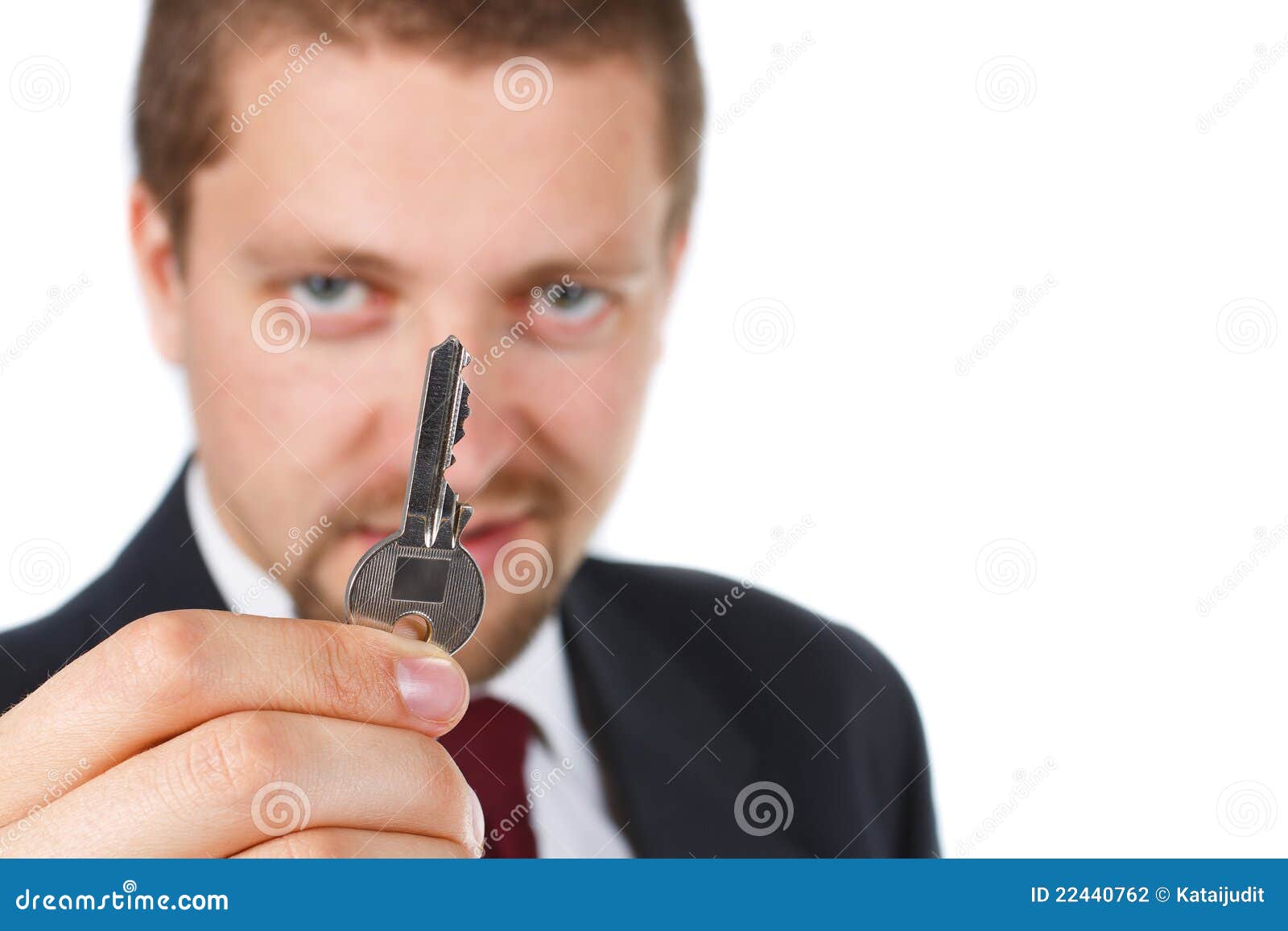 Businessman holding a key stock photo. Image of isolated - 22440762