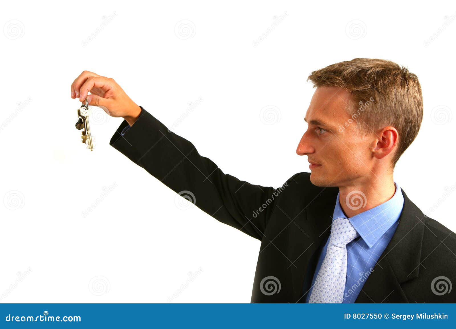 Businessman Holding the Key Stock Photo - Image of achievement, lock ...