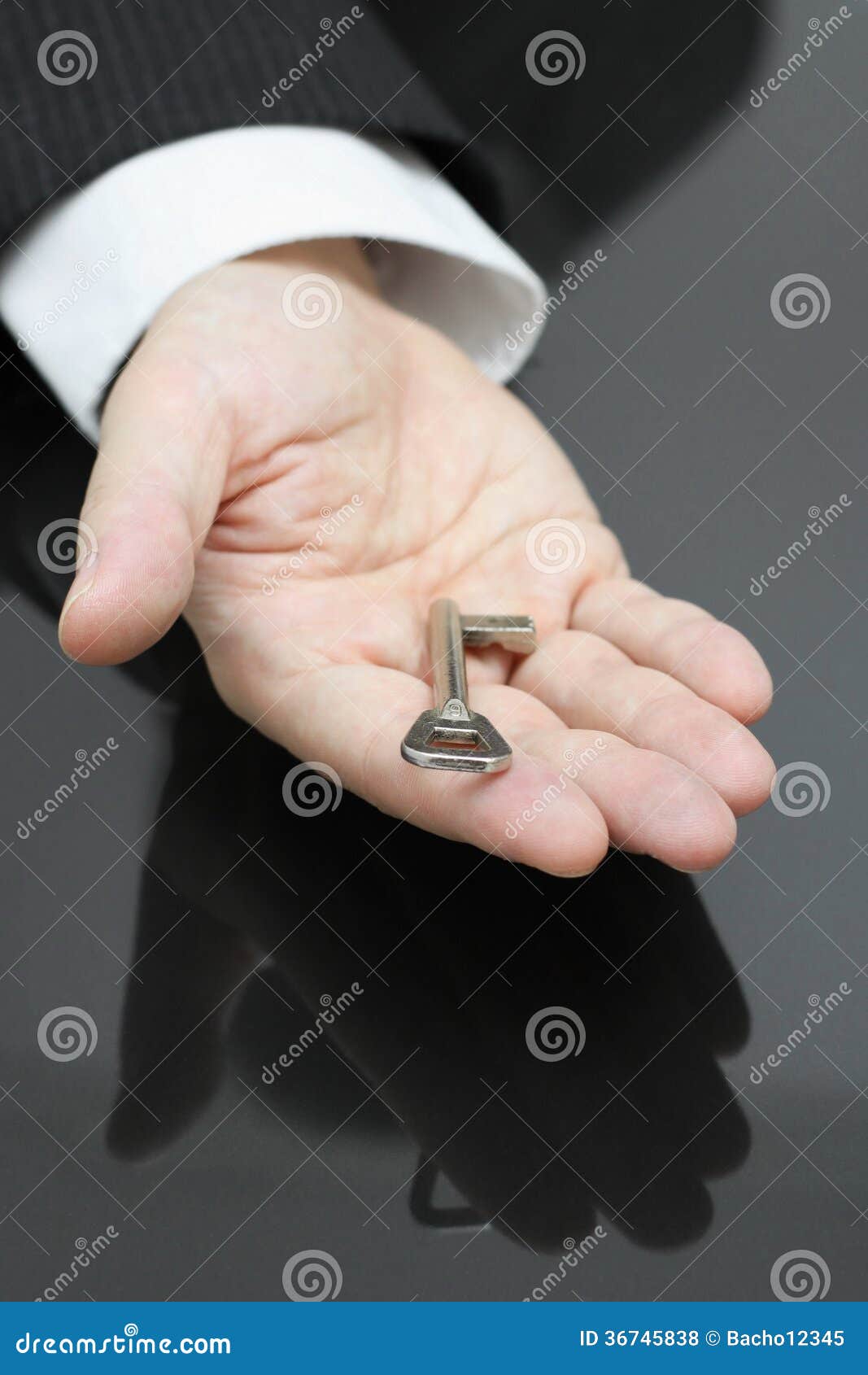 Businessman Holding the Key To Success Stock Photo - Image of future ... Businessman Holding the Key To Success Stock Photo - Image of future ...