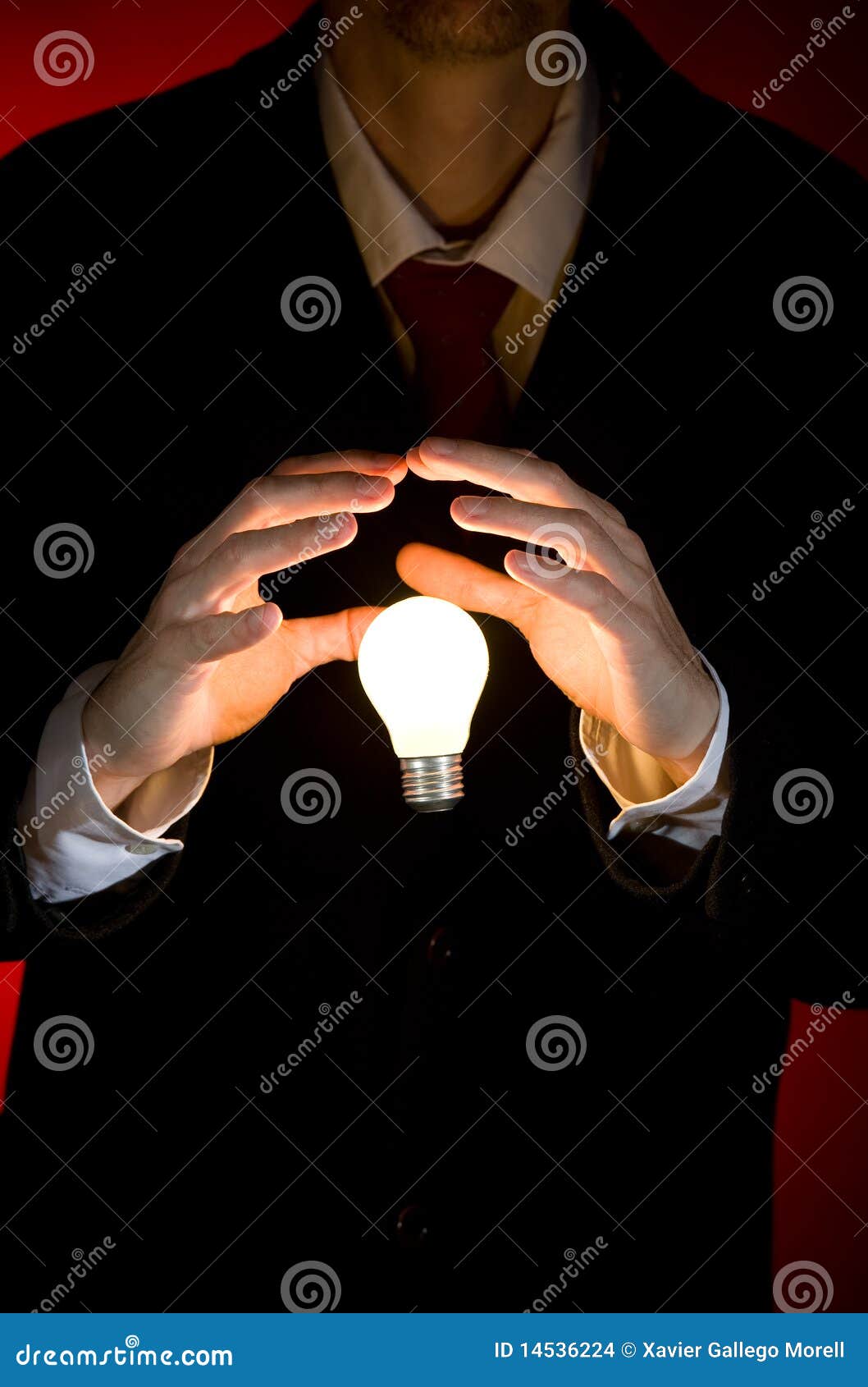 Businessman Holding Light Bulb Stock Photo - Image of brainstorming ...