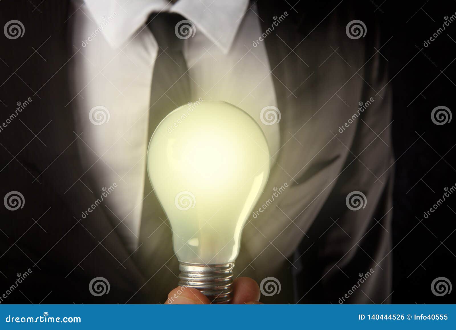 Businessman Holding Light Bulb Stock Photo - Image of manager, learn ...
