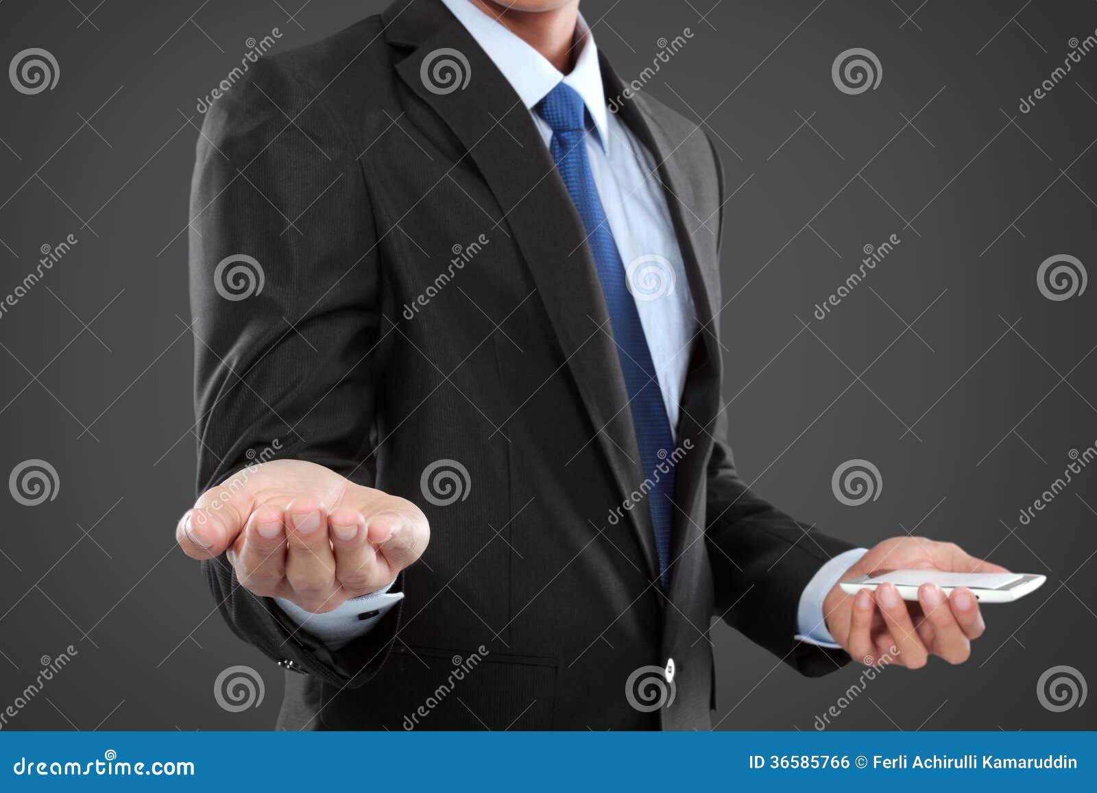 Businessman Holding Mobile Smart Phone, Another Hand Presenting Stock ...