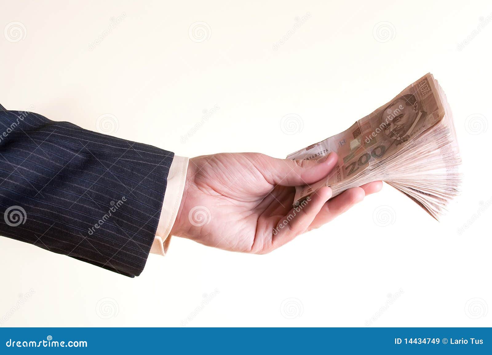 Businessman Holding Money Stack Stock Image - Image of suit, bill: 14434749