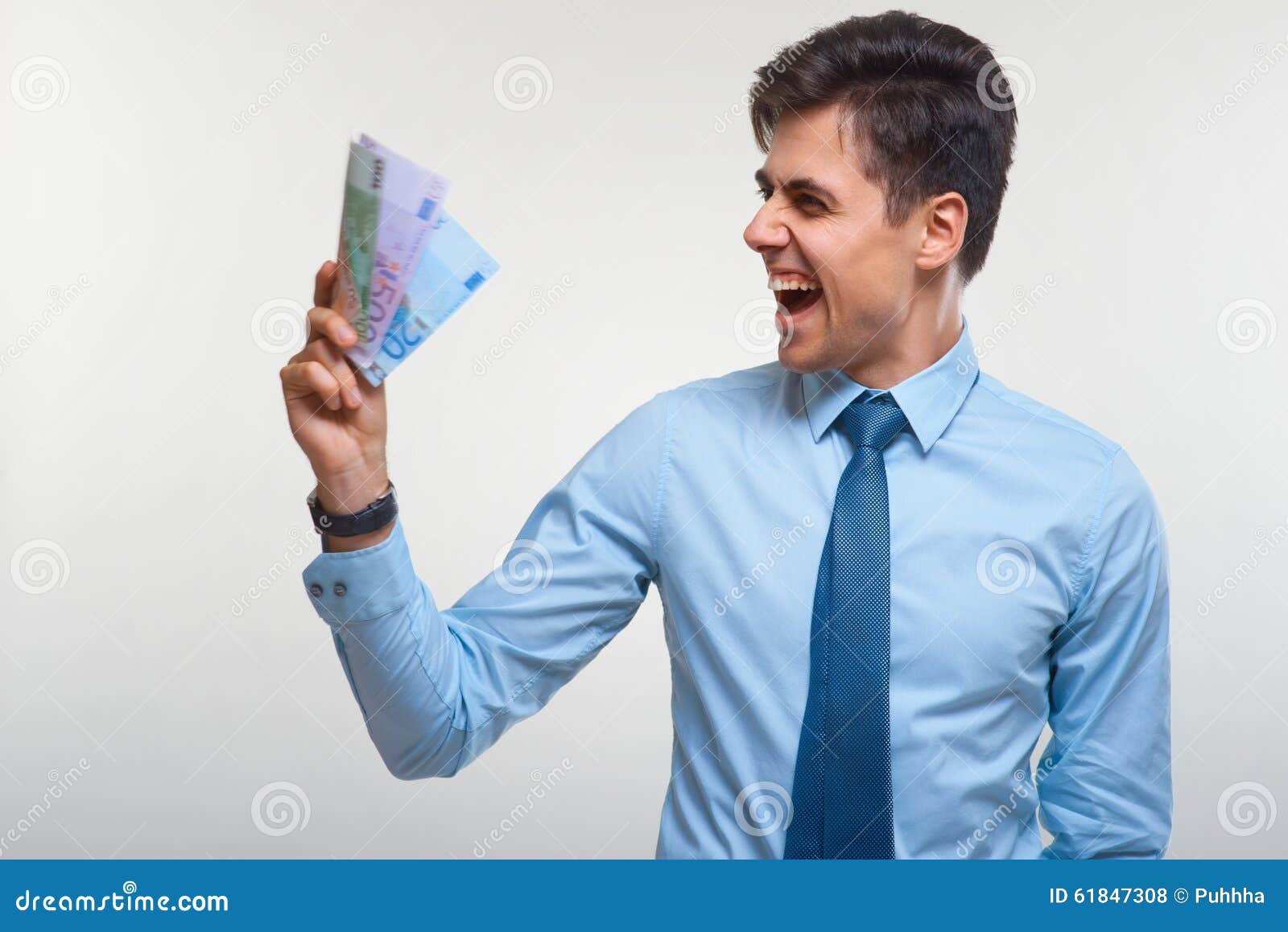 Businessman Holding Money. Success and Wealth. Stock Photo - Image of ...