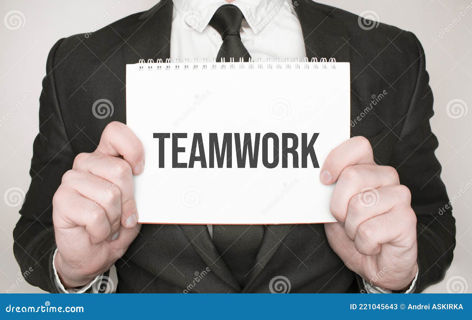 Businessman Holding a Notepad with Text Teamwork Stock Image - Image of ...