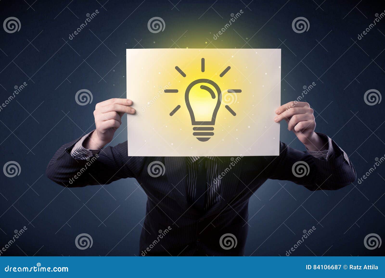 Businessman Holding Paper with Lightbulb Stock Image - Image of modern ...
