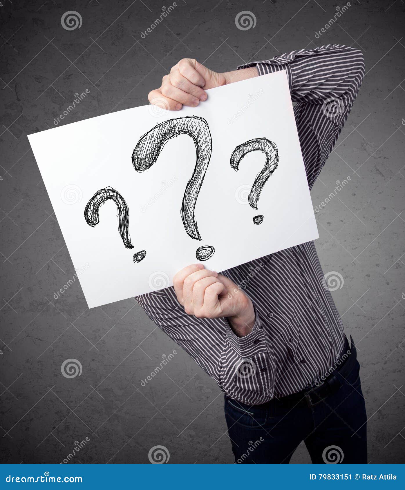 Businessman Holding a Paper with Question Marks in Front of His Stock ...