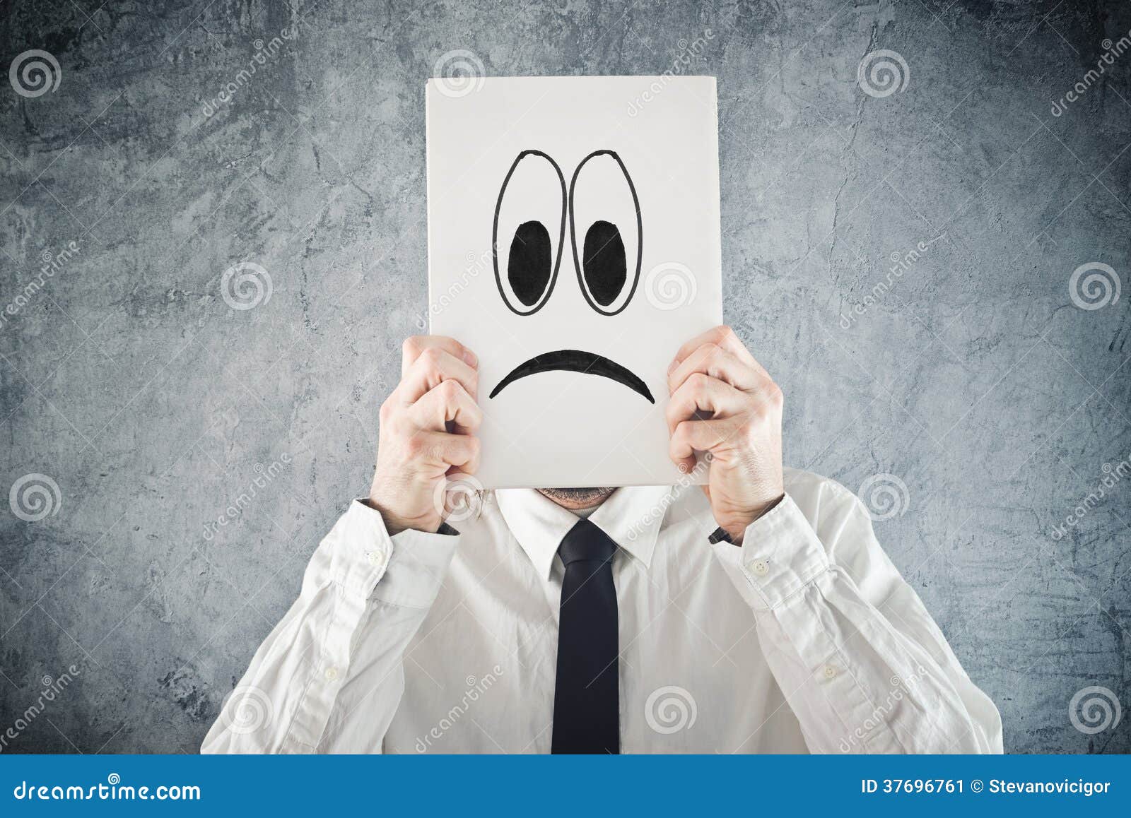 Businessman Holding Paper with Sad Face in Front of His Head Stock ...
