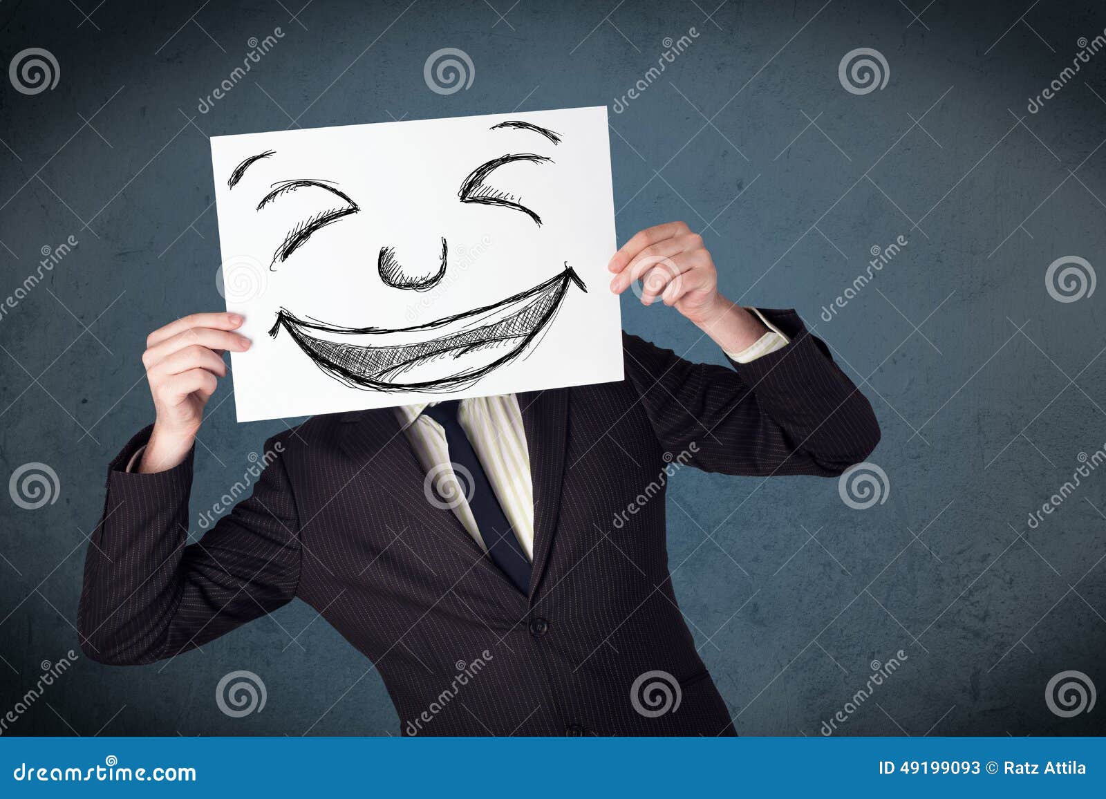 Businessman Holding a Paper with Smiley Face in Front of His Head Stock ...