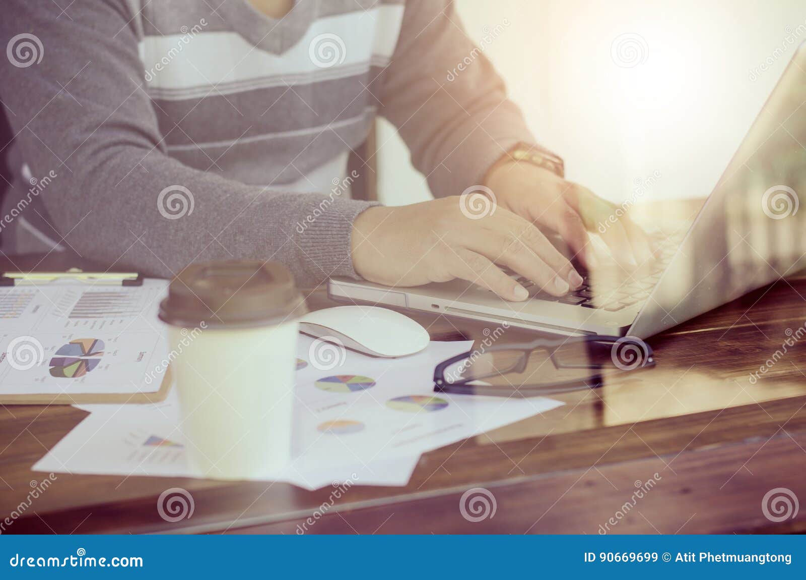 Businessman Holding Paperwork on the Table Stock Image - Image of ...