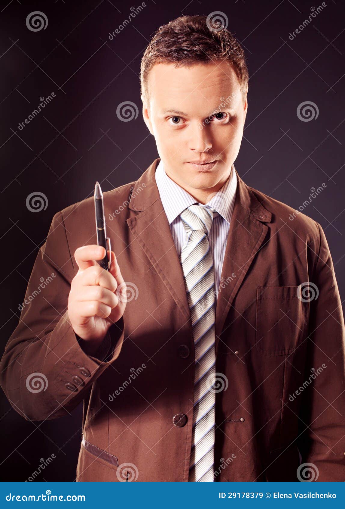 Businessman holding a pen stock image. Image of mannequin - 29178379