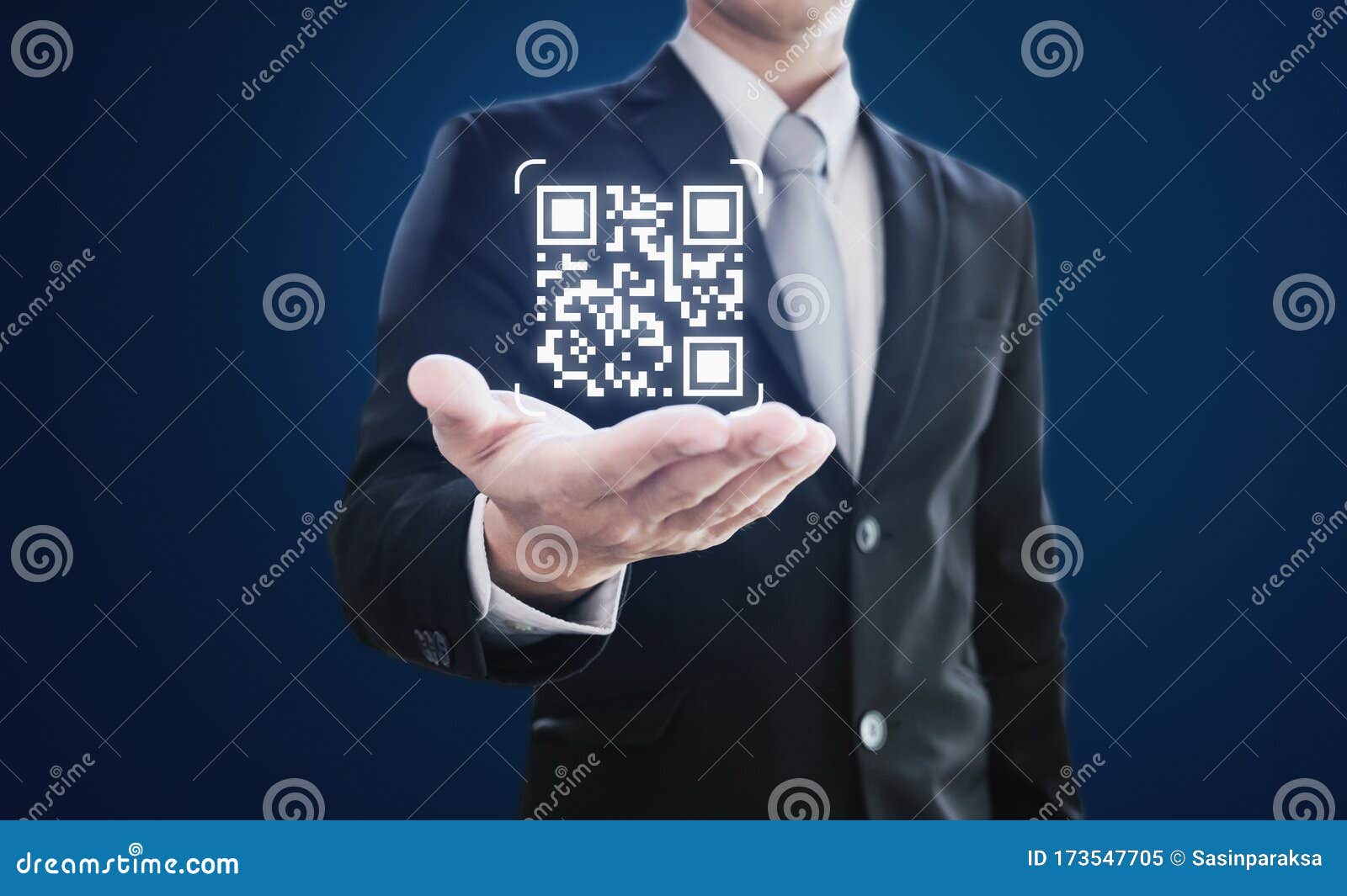 Businessman Holding QR Code on Hand. QR Code Scanning Payment and ...