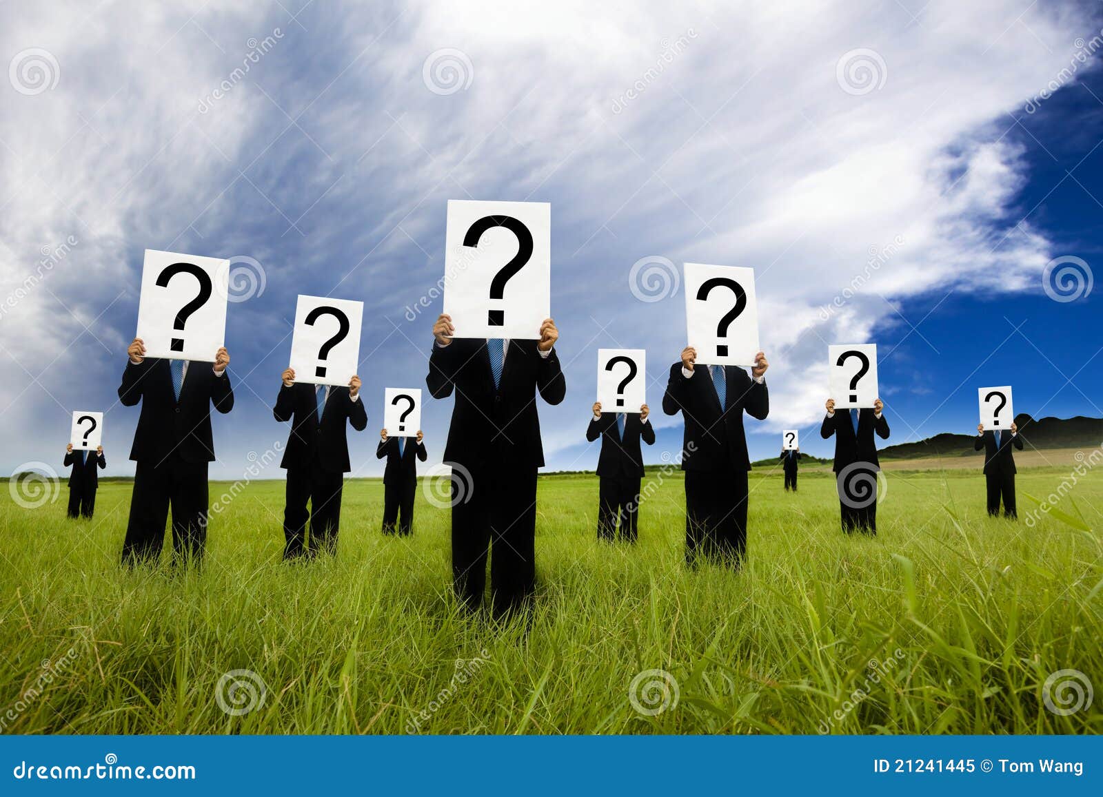 Businessman Holding Question Mark Stock Image - Image of stand, confuse ...