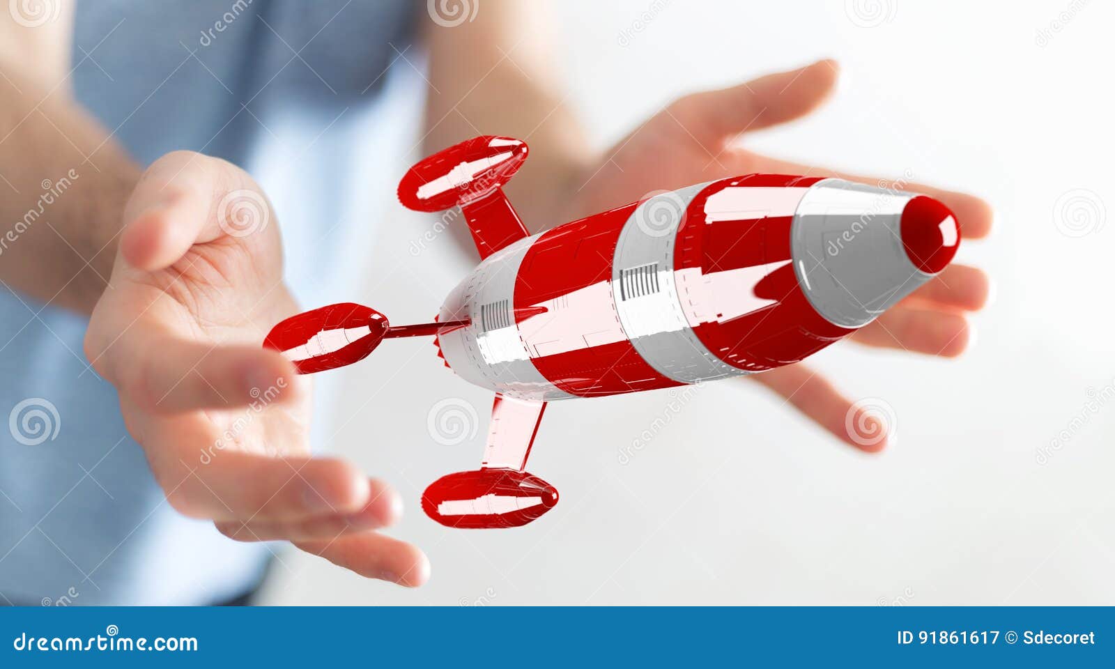 Businessman Holding Red Rocket in His Hand 3D Rendering Stock ...