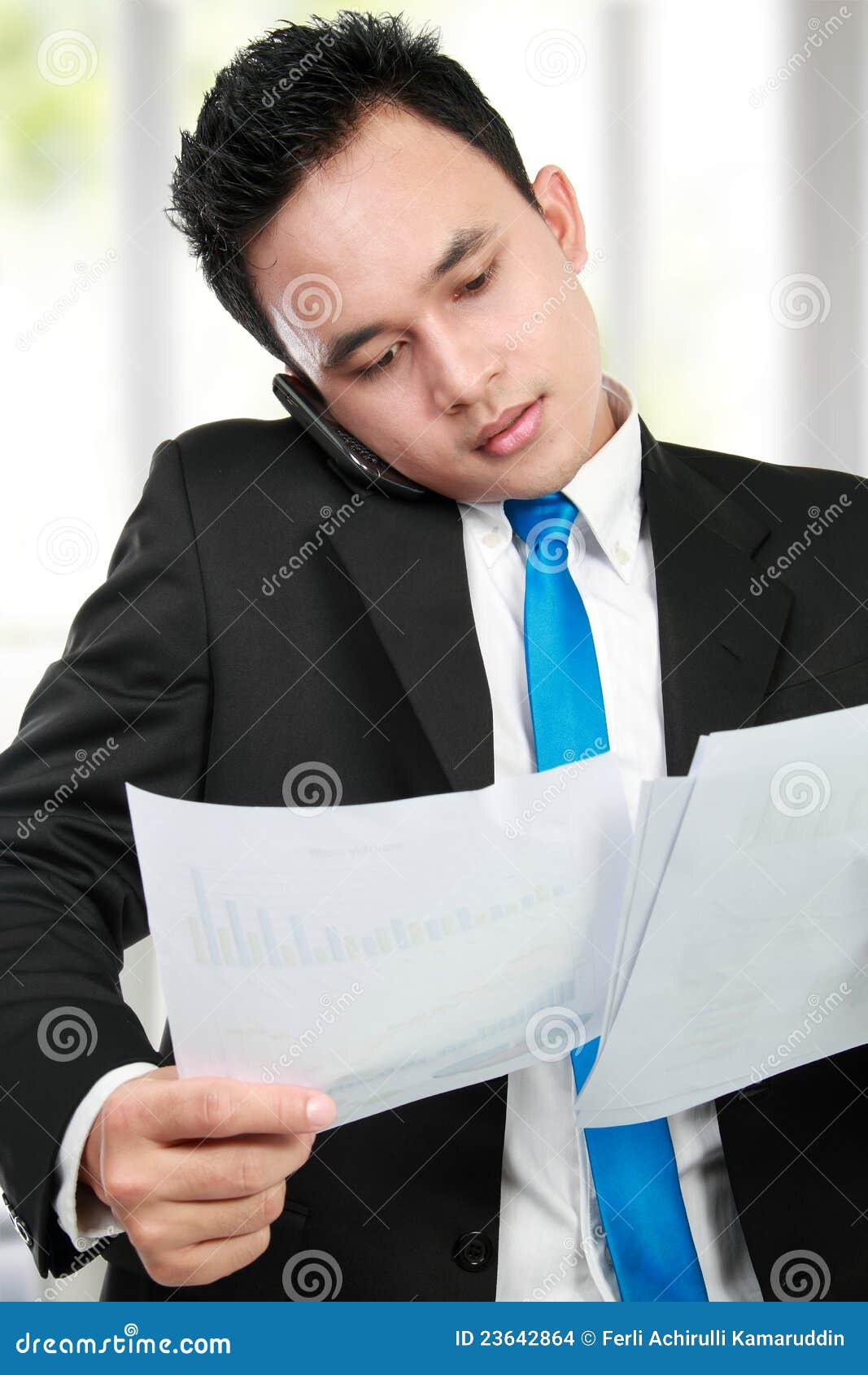 Businessman Holding a Report Stock Photo - Image of business, person ...