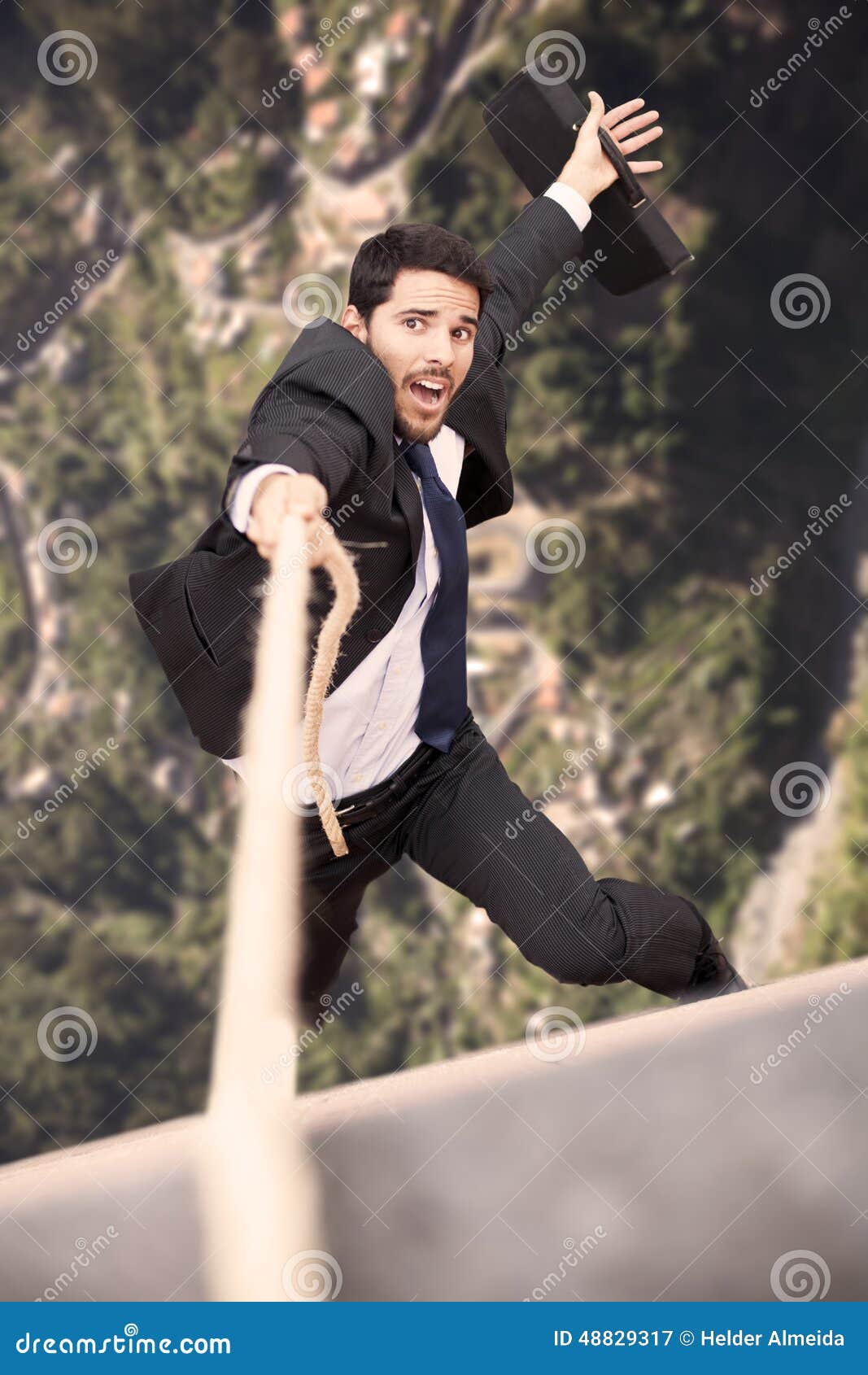 Businessman holding a rope stock image. Image of fear - 48829317
