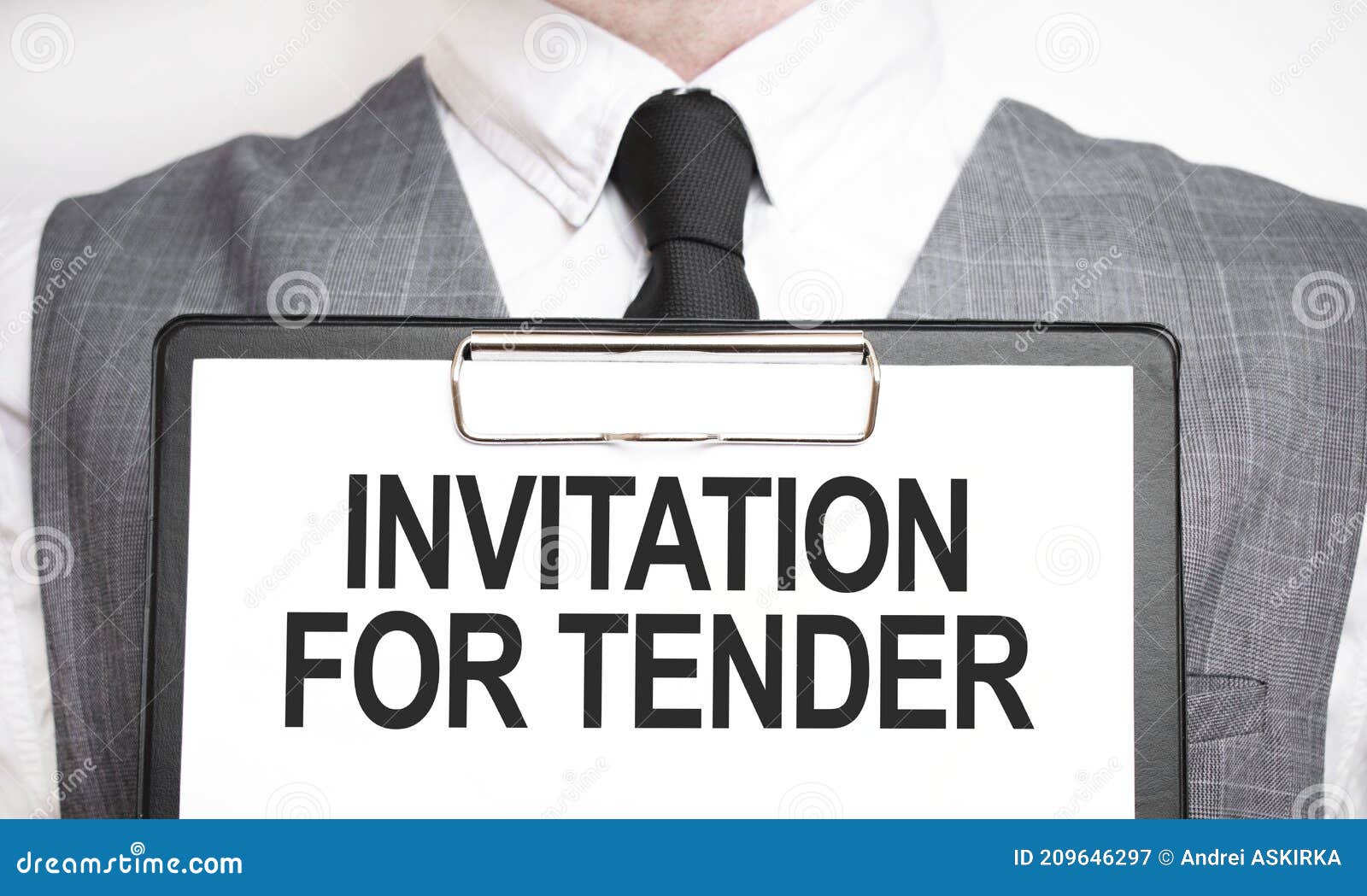Businessman Holding Sheet of Paper with a Message INVITATION for TENDER ...