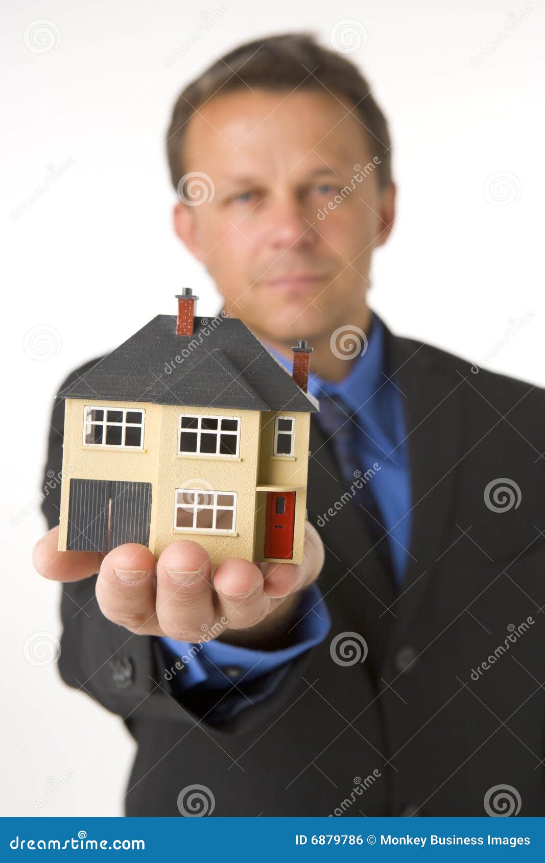 Businessman Holding Small House Stock Photo - Image of goal, concept ...