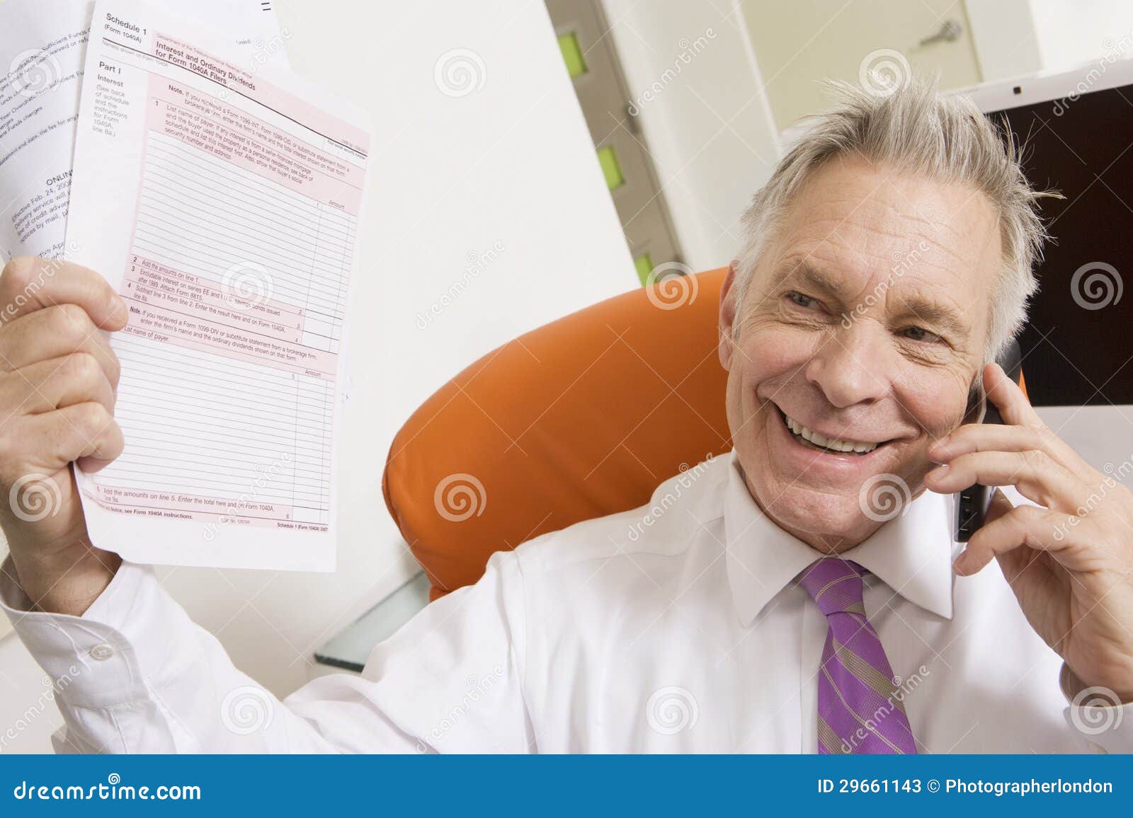 Businessman Holding Tax Forms Stock Image - Image of form, executive ...