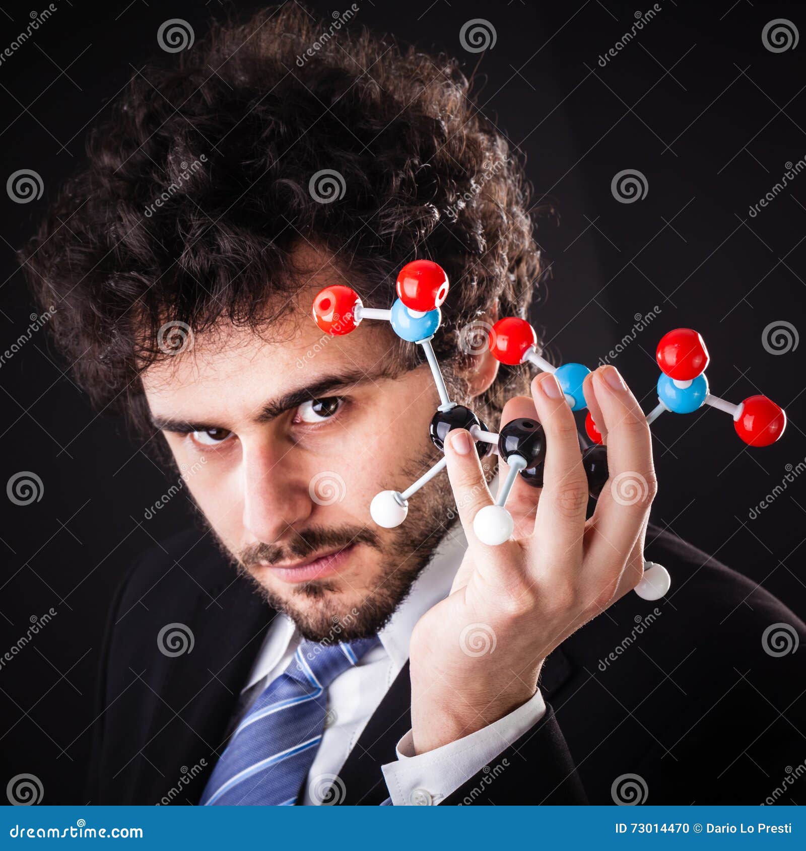 Businessman Holding Tnt Atomic Structure Stock Photo - Image of ...