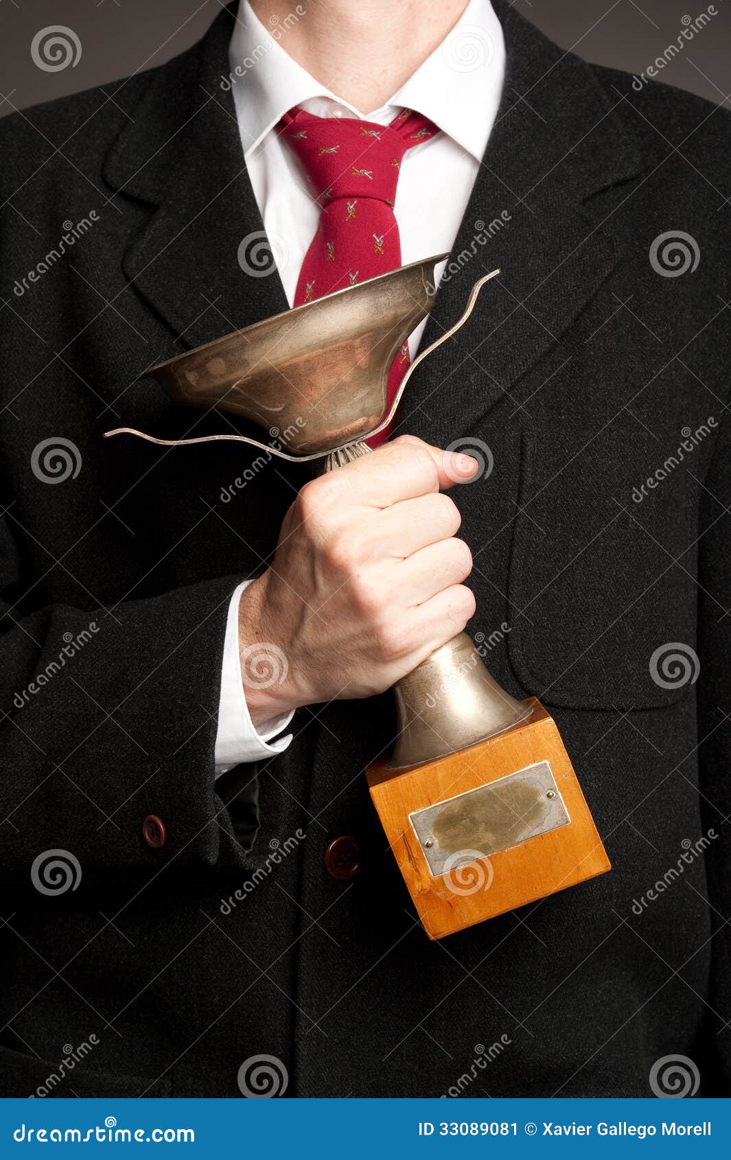 Businessman Holding a Trophy Stock Image - Image of antique, victory ...