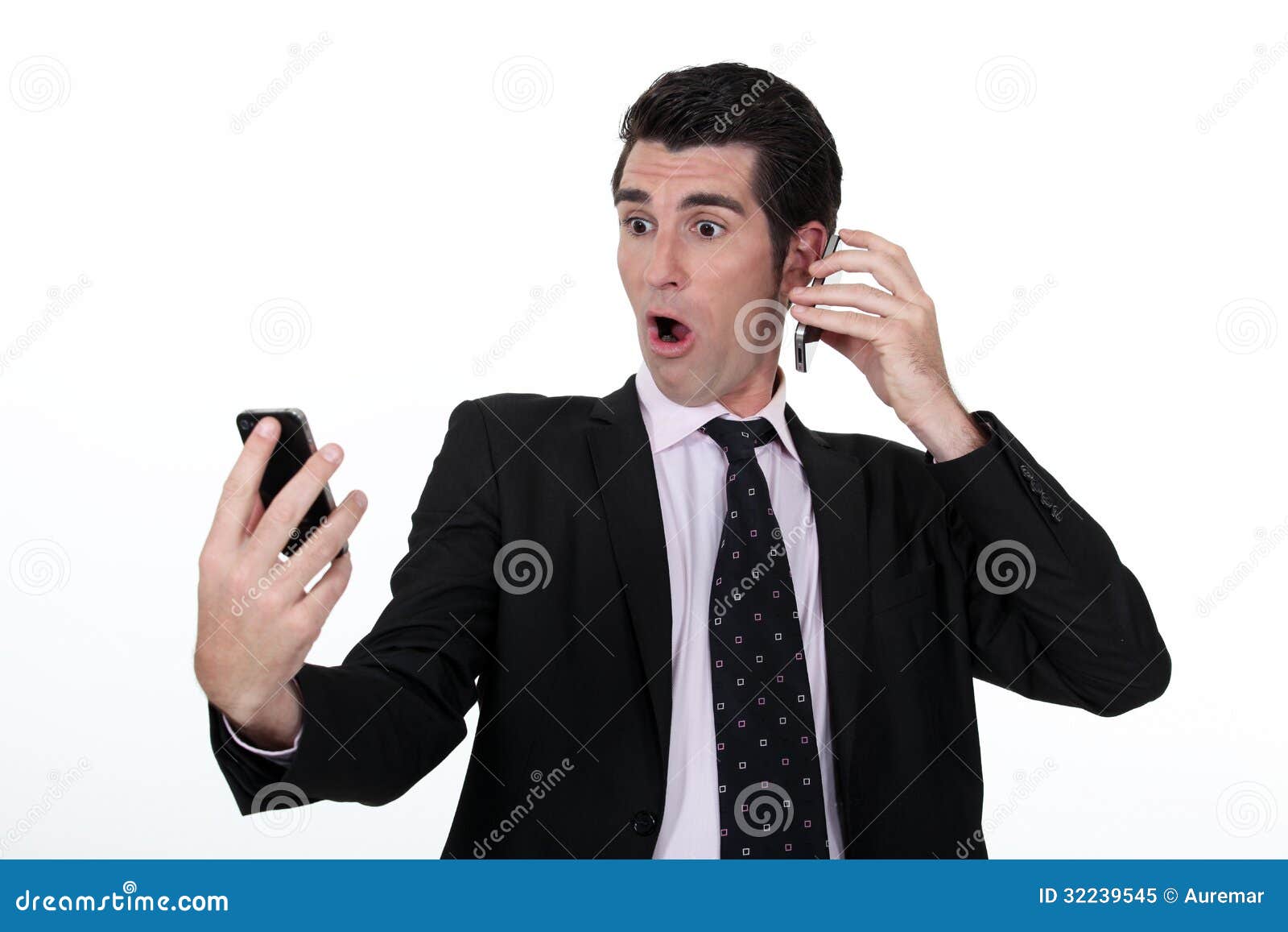 Businessman Holding Two Cell Phones Stock Image - Image of internet ... Businessman Holding Two Cell Phones Stock Image - Image of internet ...