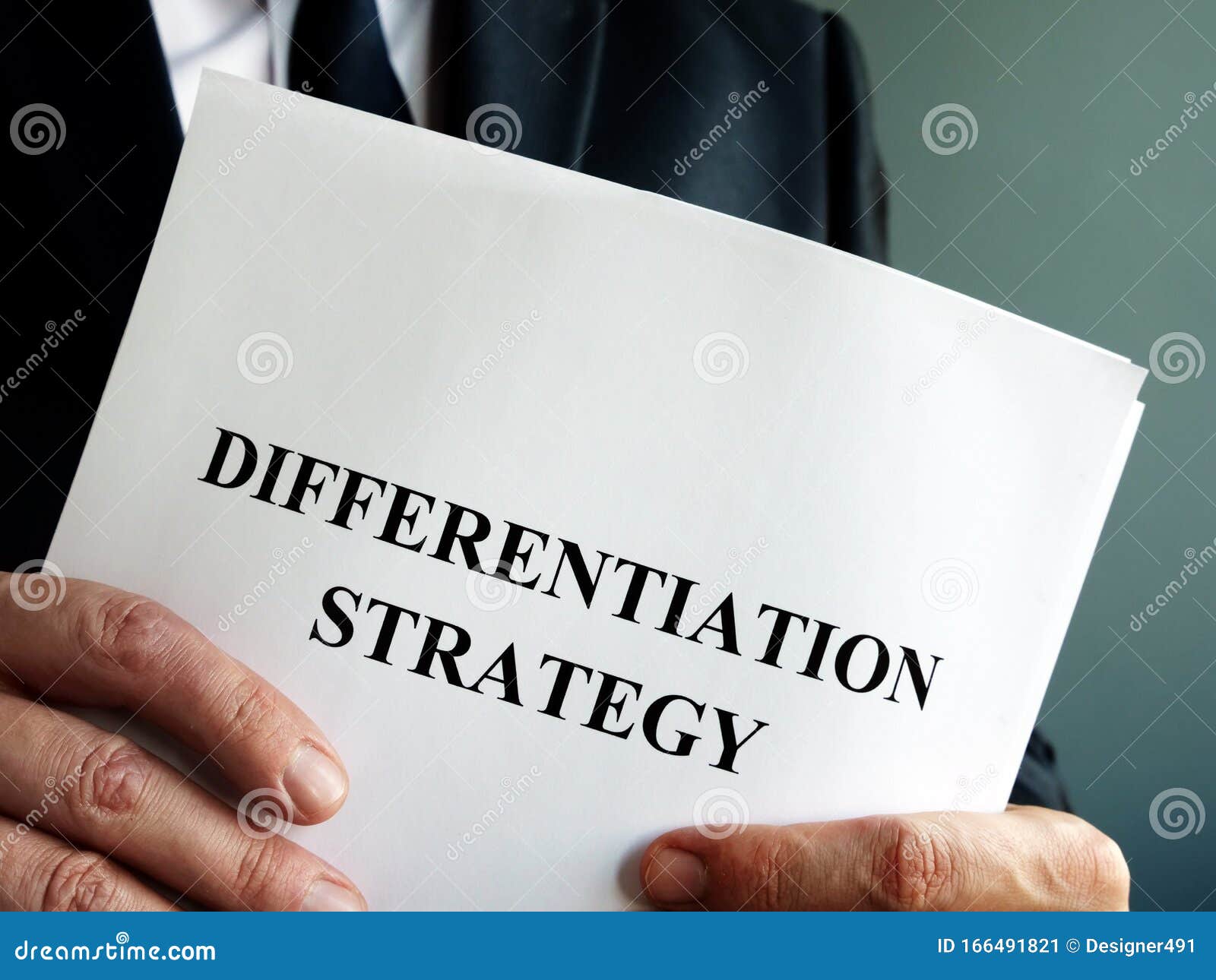 Businessman Holds Differentiation Strategy. Stock Image - Image of ...