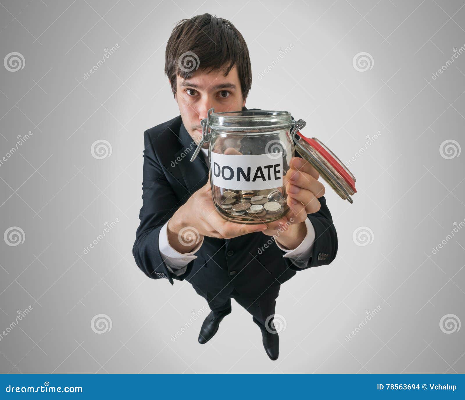 Businessman Holds Jar with Coins and Asking for Donation Stock Photo ...
