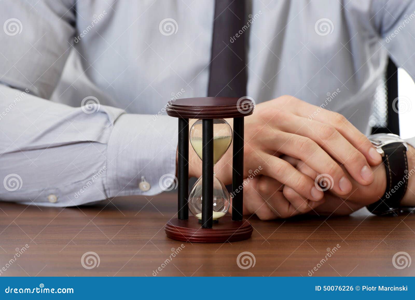 Businessman with Hourglass in the Office. Stock Photo - Image of hour ...