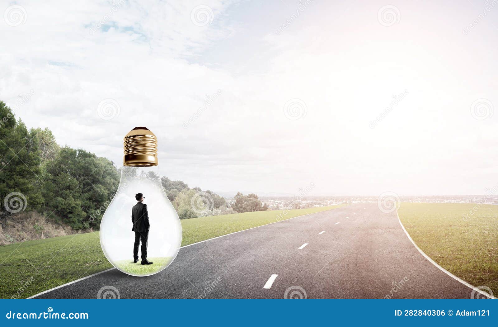 Businessman Inside Light Bulb Stock Photo - Image of idea, otdoor ...