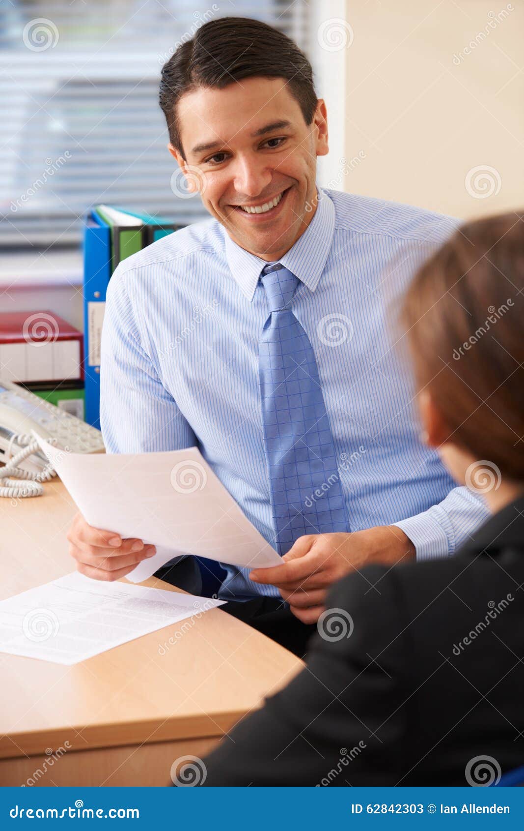 Businessman Interviewing Female Job Applicant Stock Image - Image of ...
