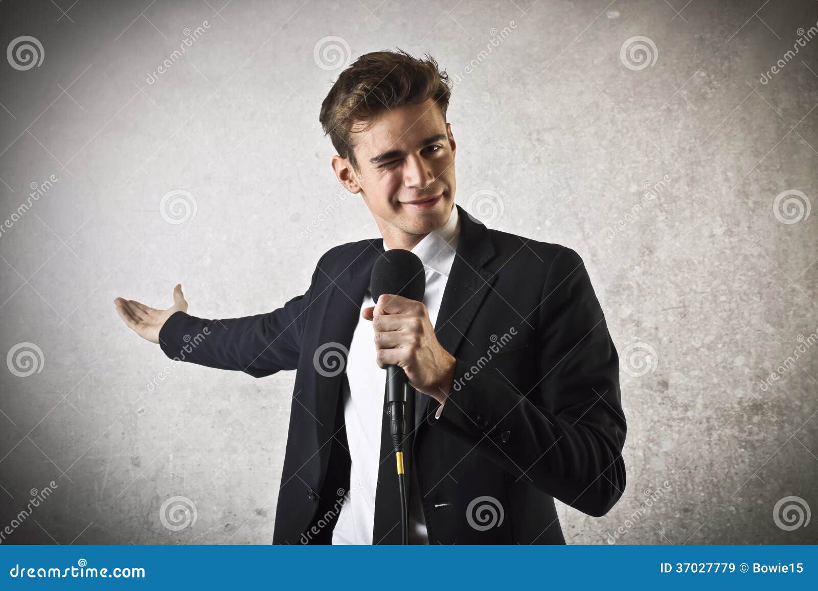Businessman Introducing Someone Stock Image - Image of wall, announcer ...
