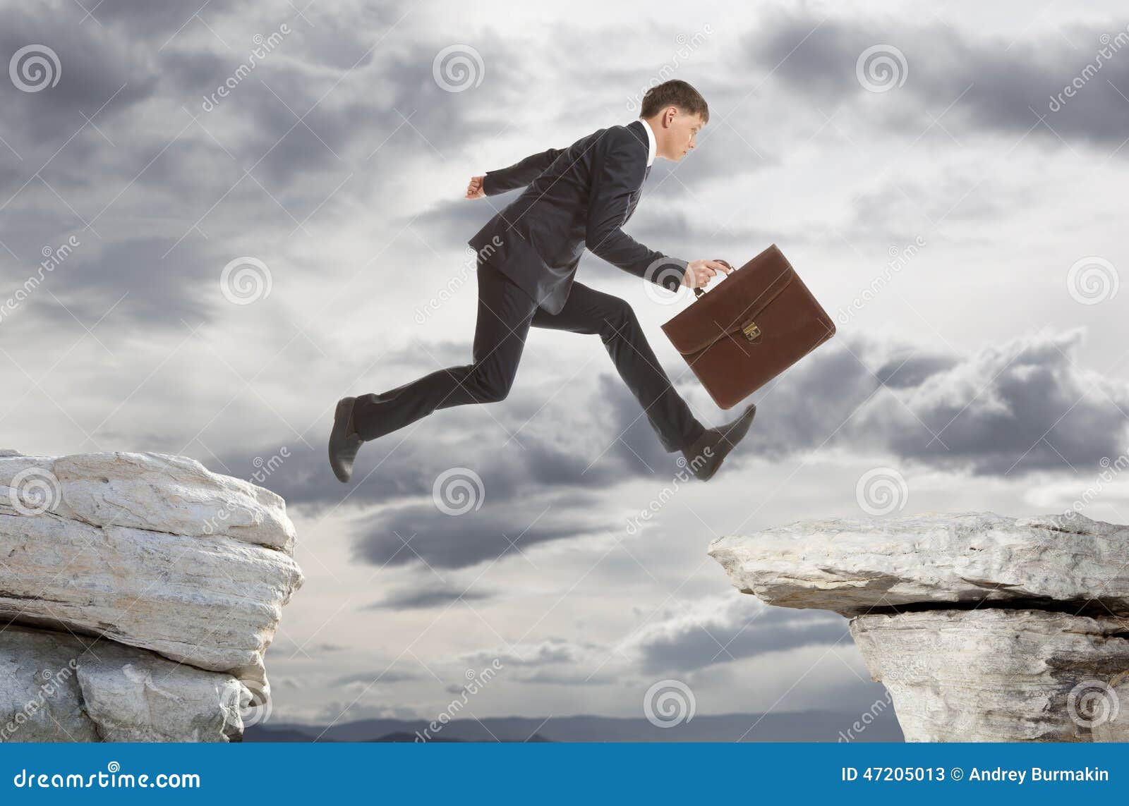 Businessman Jumping Over Rocks Stock Image - Image of business ...