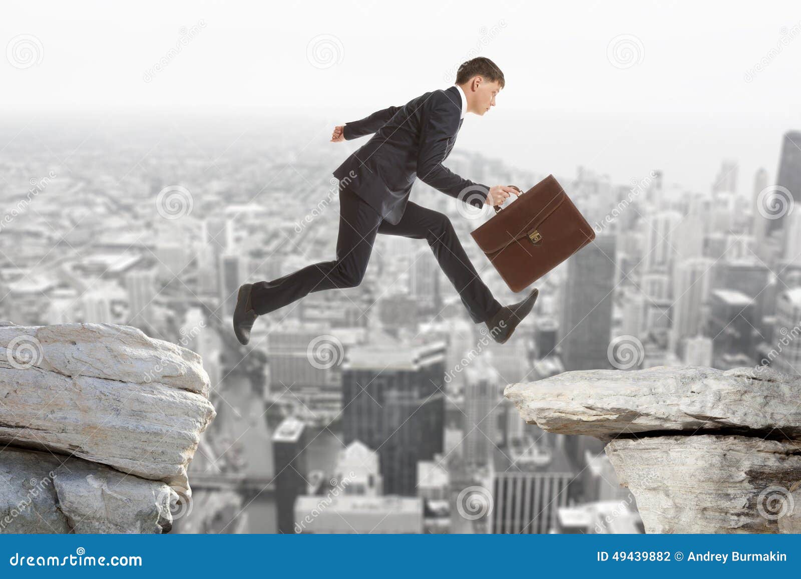 Businessman Jumping Over Rocks Stock Photo - Image of fast, difficult ...